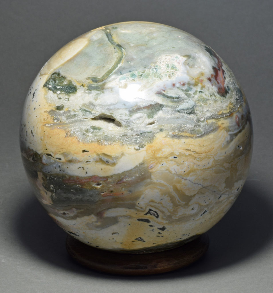 10 cm Polished ocean jasper sphere with outstanding colors