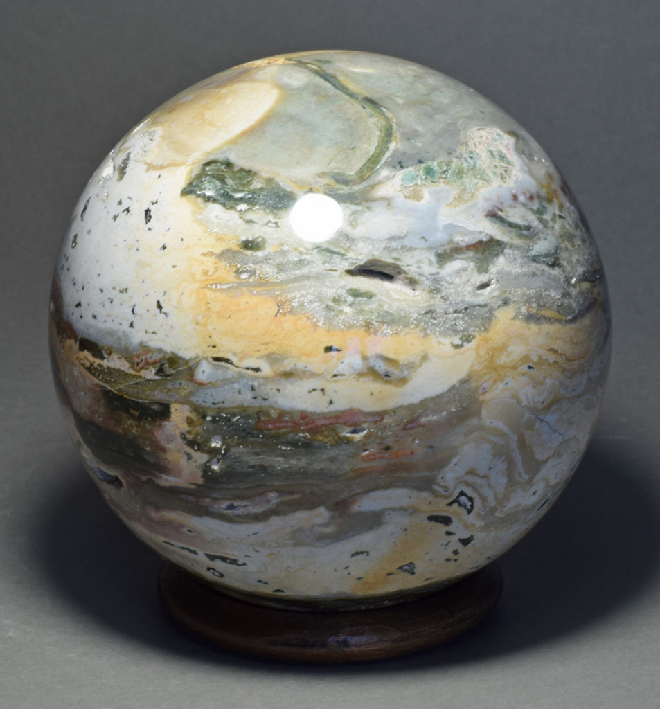 10 cm Polished ocean jasper sphere with outstanding colors