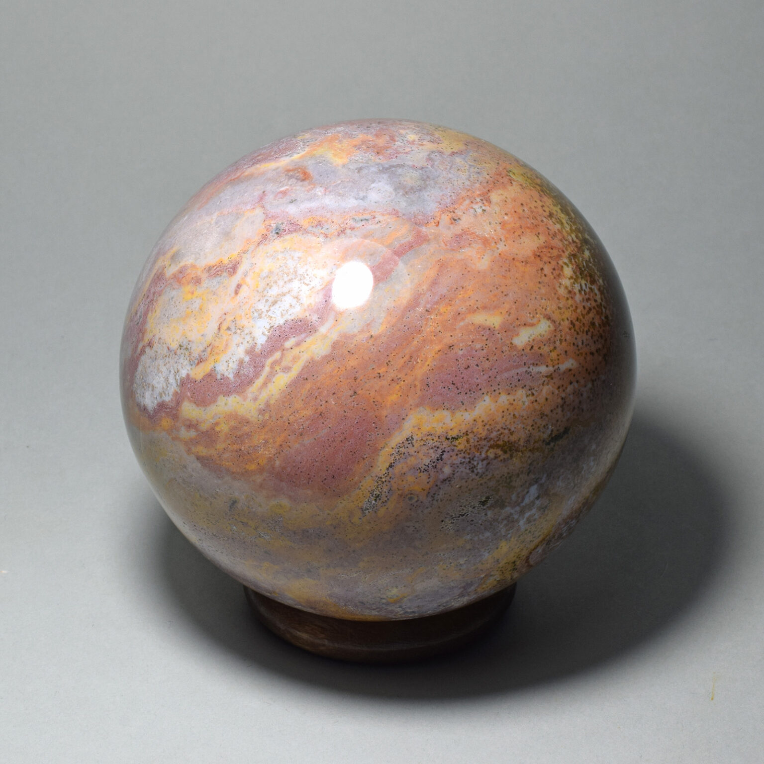 9.9 cm Polished Ocean Jasper sphere with outstanding colors
